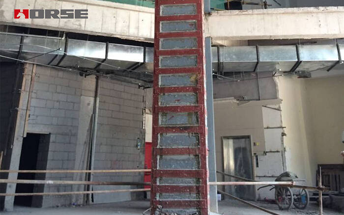 Beam column bonded steel plate and FRP wrap